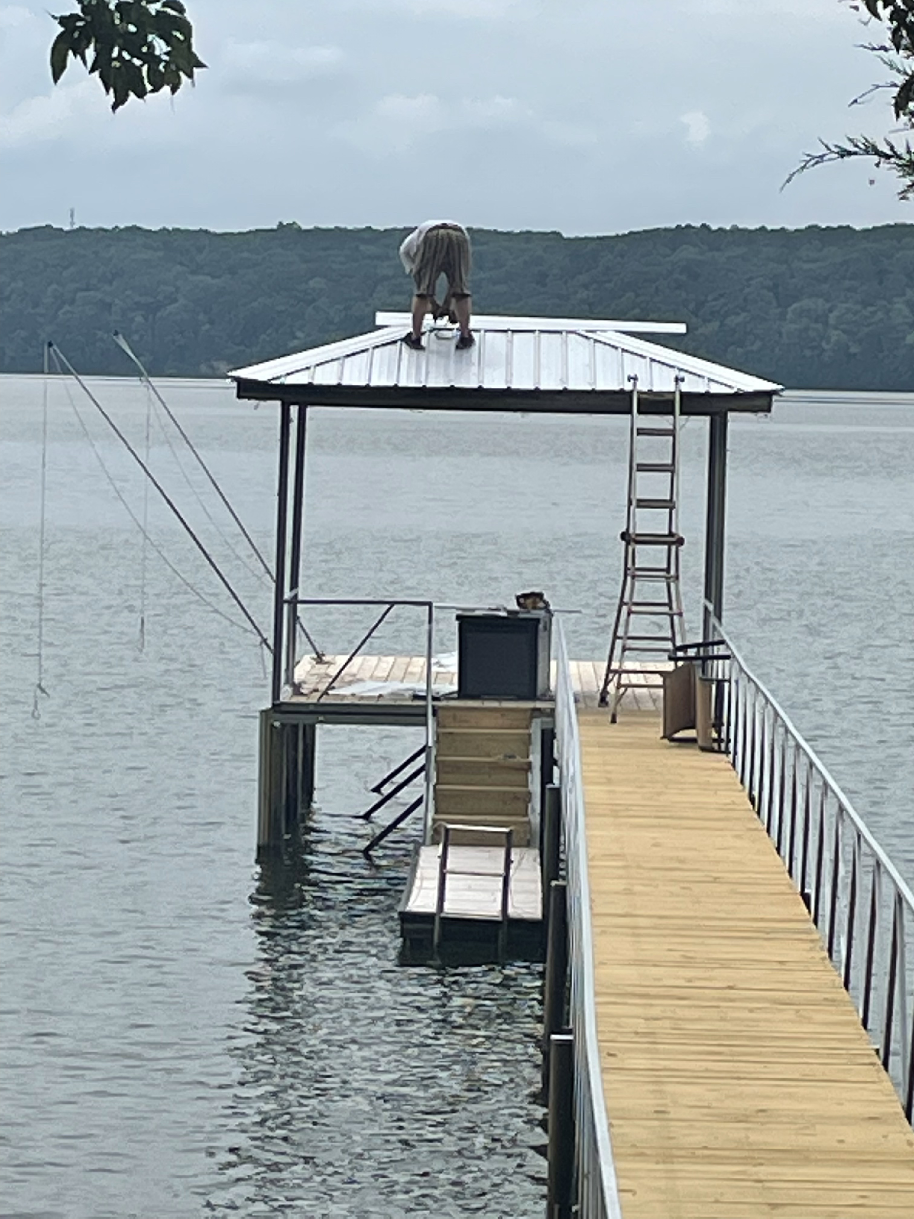 Lake view with a dock – Coffee and Construction Dust